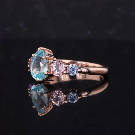 6×8mm Pear Cut Lab Grown Paraiba Sapphire With Side Moissanite 10k Rose