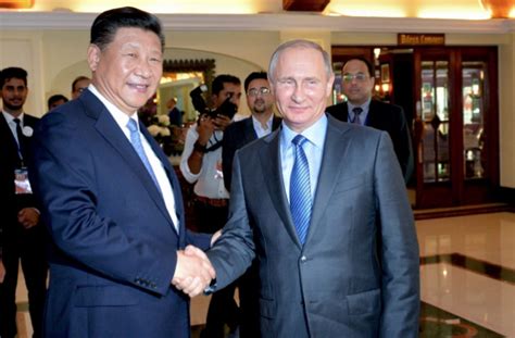 Путин поздравил Си Цзиньпина с переизбранием