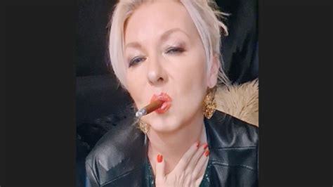 Smoker Mummy Puffs Intensely And Sexy Her Cigar Sucks Deeply The