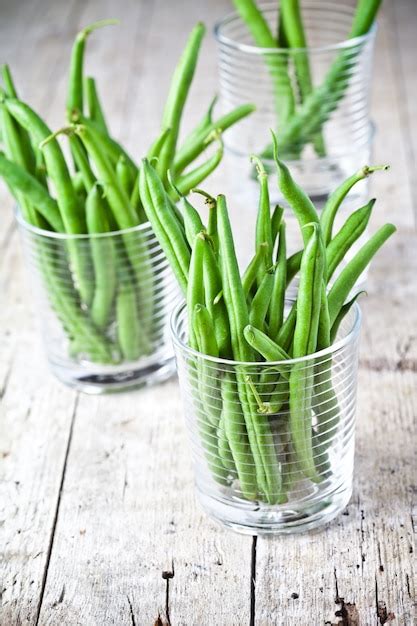 Premium Photo Green String Beans In Glasses