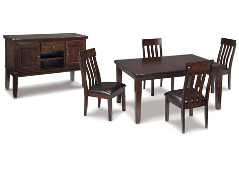 Haddigan Dining Table And 4 Chairs With Storage Set