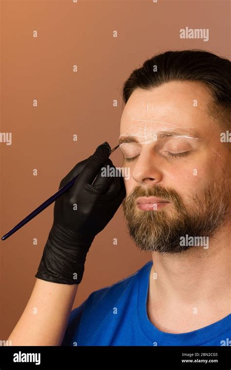 Permanent Makeup For Eyebrows Tinting Brows Handsome Man With Eyebrows In Barber Shop Brutal