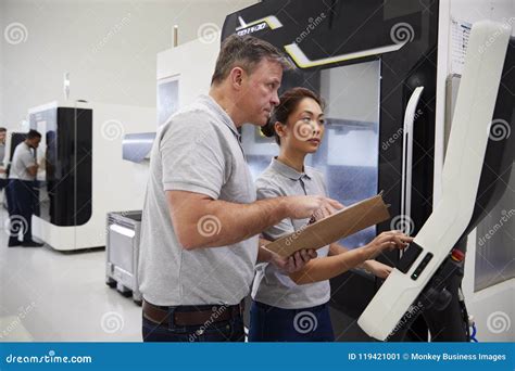Engineer Training Female Apprentice To Use Cnc Machine In Factor Stock Image Image Of Interior