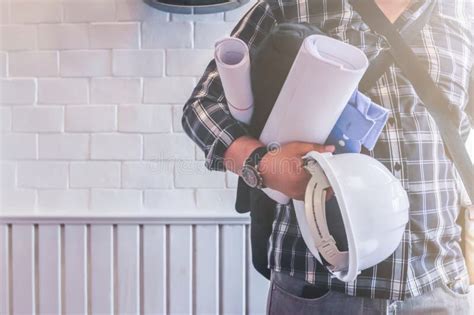 Architect Prepares Blueprints For Engineers To Check Blueprints Before Construction And