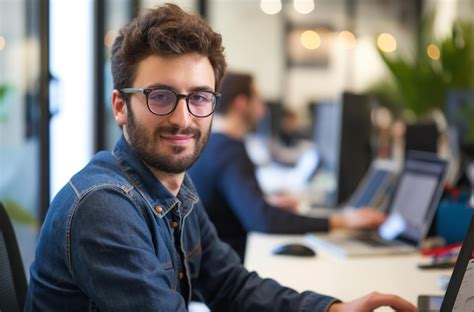 Premium Photo Smiling Software Engineer In Office