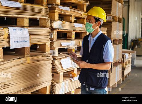 Worker Checking Raw Material In Store For Factory Industrial Safety Engineer Stock Photo Alamy