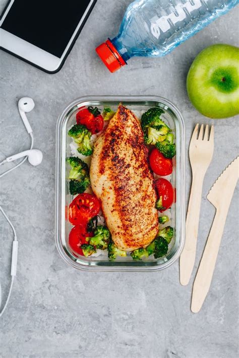 Grilled Chicken Meal Prep Containers With Rice Broccoli And Tomatoes