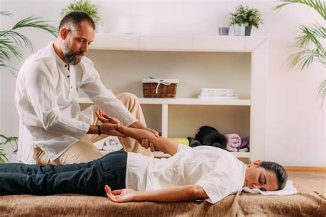 Shiatsu Hand Massage Therapist Massaging The Heart Meridian Premium Photo