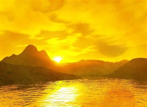 Download A Vibrant Yellow Sky During Sunset Wallpaper