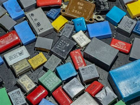A Detailed Shot Of Various Electronic Capacitors Showcasing The