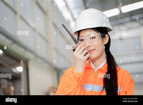 Engineer Asian Women Using Radio Communication In Factory Stock Photo Alamy
