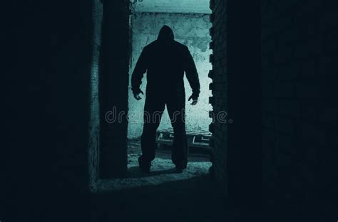 Man Standing In The Dark