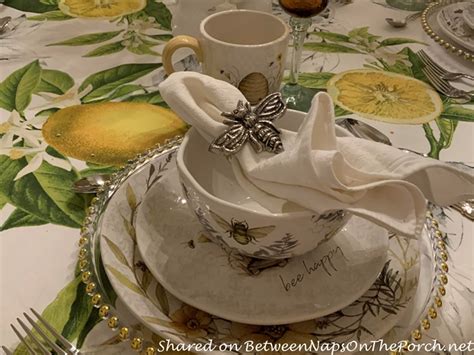 A Bee Themed Table Setting With Bee Dinnerware And Bee Flatware