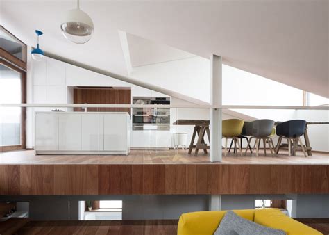 Oyos House Pibo Features A Sloping Green Roof And Split Levels