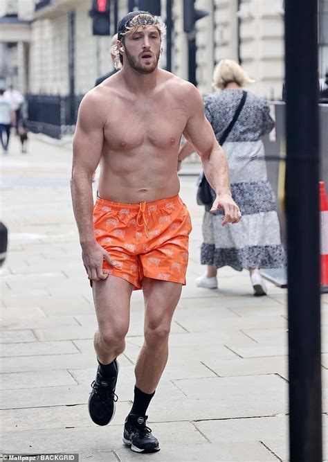 Logan Paul Shows Off His Toned Physique As He Jogs Shirtless In London With Girlfriend Nina