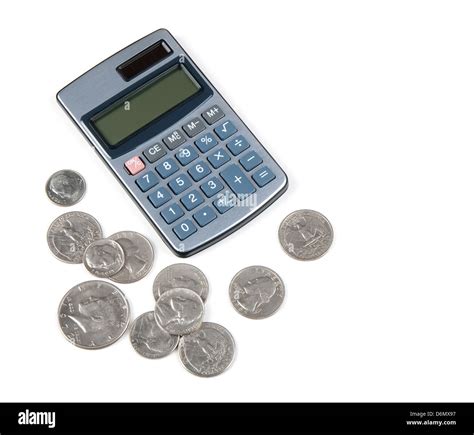 Calculator And US Coins On White Background Stock Photo Alamy