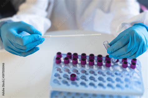 Process Of Coronavirus Testing Examination By Nurse Medic In Laboratory Lab COVID Swab