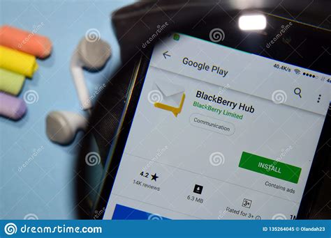 blackberry hub dev app with magnifying on smartphone screen editorial