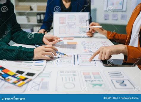 Ux Developer And Ui Designer Brainstorming About Mobile App Interface Wireframe Design Stock