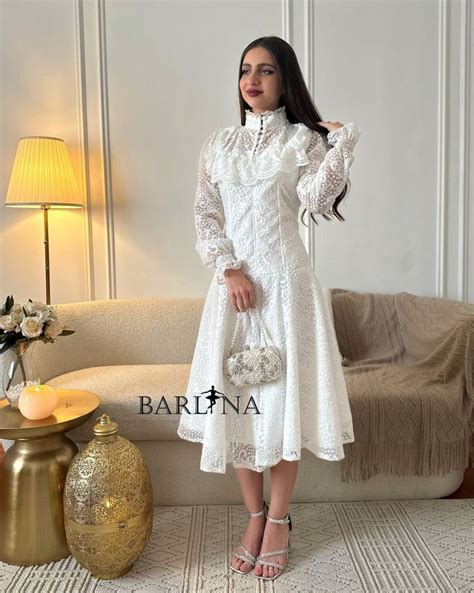 فستان عيد أبيض دانتيل ميدي أنيق بأكمام شفافة مع كسرات Elegant Lace