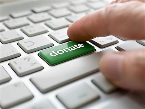 pressing the donate button on a computer keyboard premium ai