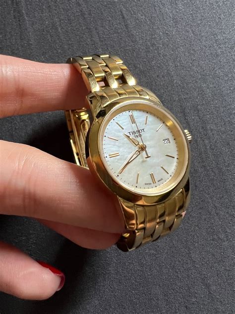 101 original tissot watch gold mother of pearl not tag rolex