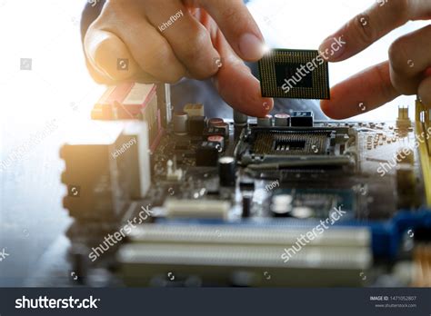 Asian Technician Putting Cpu On Socket Stock Photo Shutterstock