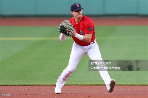 Enrique Hernandez Of The Boston Red Sox Throws To First Base During