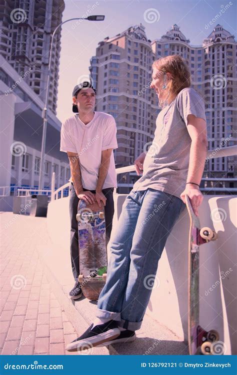 Cheerful Male Person Standing Opposite His Partner Stock Image Image Of Architecture