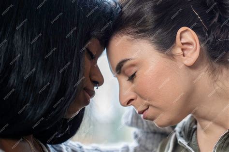 Premium Photo Homosexual Couple Of Young Women Hugging At Home