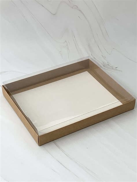 Универсальная коробка с прозрачной крышкой 26х21х3 см., крафт - Centerpack