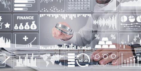 Man Holding Magnifying Glass With A Graphs And Charts Business Stock