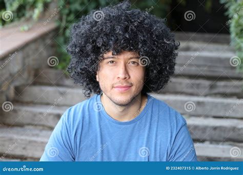 Young Hispanic Man With Curly Hair Stock Image Image Of Fashionable