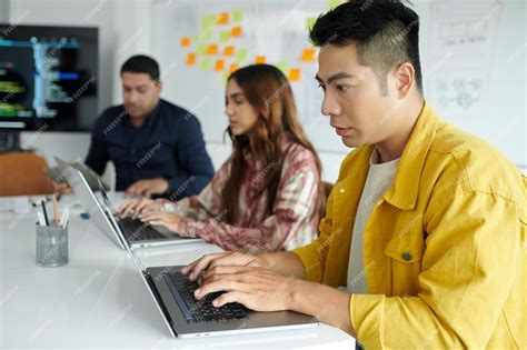 Premium Photo Panicking Devops Engineer Fixing Bugs In Programming Code