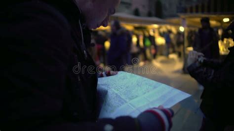 Confused Man Looking At Paper Map Checking Route Direction To Trip Destination Stock Footage