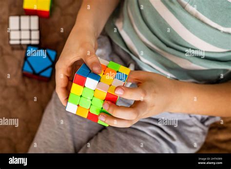 Closeup Hands Male Teenager Assembling Rubiks Cube Multicolored