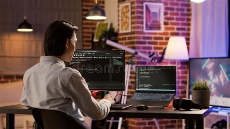 Male Coder Programming Server Encryption On Firewall Software Stock