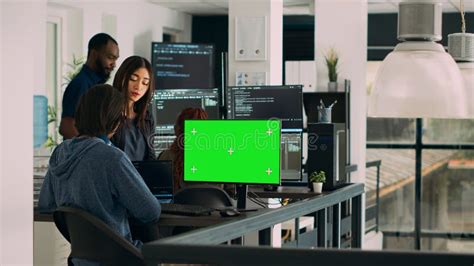 Team Of Programmers Working On Source Code With Greenscreen Monitor Stock Image Image Of