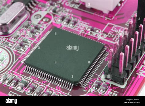 Chip On Motherboard Mainboard With Controllers Ports And Wires Close Up Macro Toned Stock