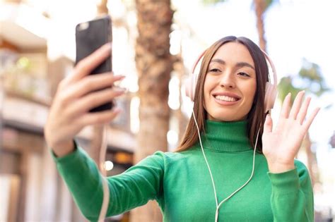 Premium Photo Model Using A Smart Phone