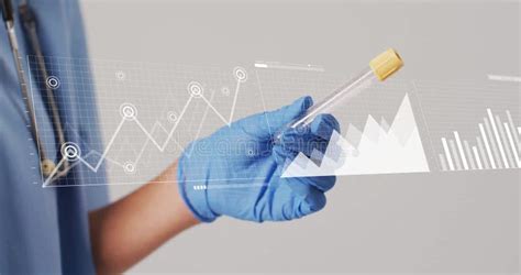 Holding Test Tube Gloved Hand With Data Analysis Image Over It Stock