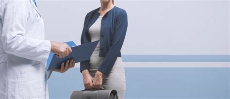 Premium Photo Doctor Meeting A Female Patient In The Hospital Aisle