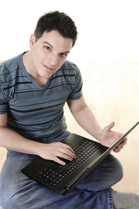 Man In Smiling With A Laptop Stock Photo Image Of Home Floor