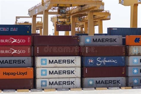 View Of The Container Terminal With Stored Containers And Terminal Equipment In Sea Port Of