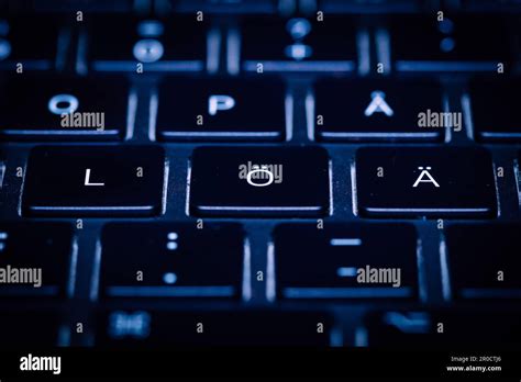 Swedish Language Keyboard With White Lettering Keys And Their Corresponding Characters Stock