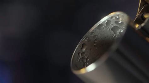 Premium Photo Extreme Close Up Of Steel Kettle Spout With Drops Of Water On Its Surface Action