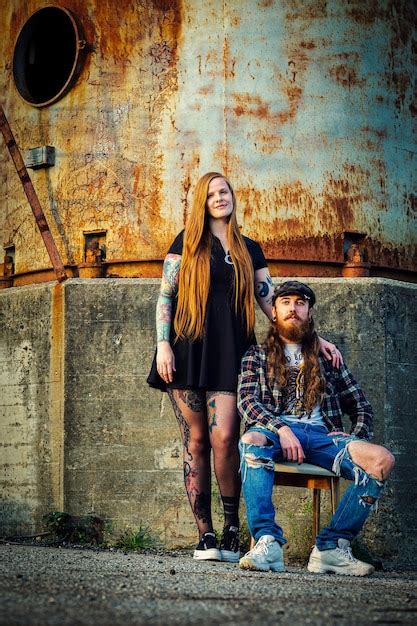 Premium Photo Full Length Portrait Of Couple Against Built Structure