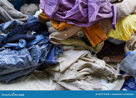 Garbage Dump With A Lot Of Clothes On The Street Environmental