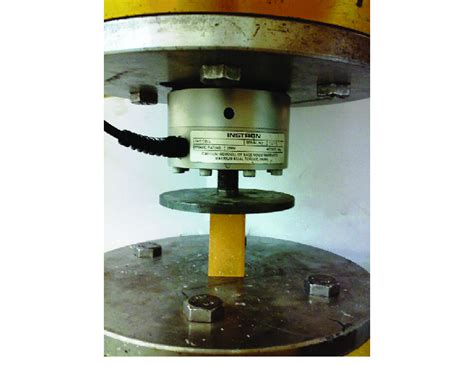 A Composite Sample With 60 Mm Height Under Loading By An Instron 8802