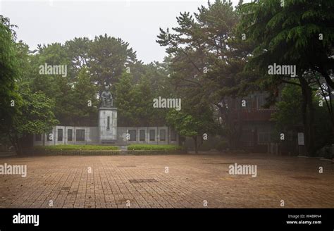 Central Square With Statue Of Choe Chiwon And Pavilion In Dongbaek Park On A Foggy Day Haeundae